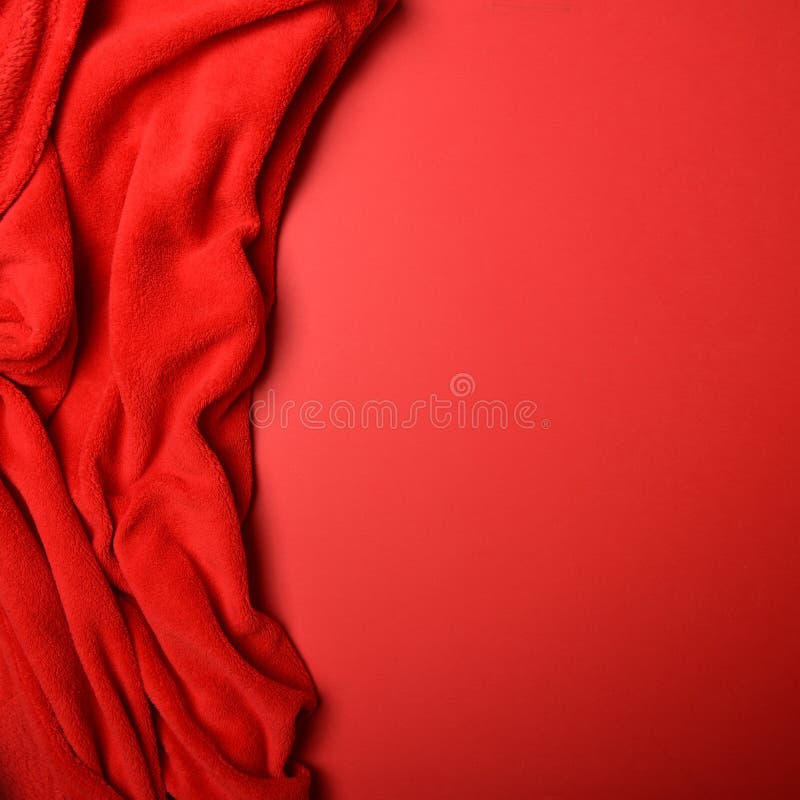 Red Blanket Against Red Background with Space for You Text or Object ...