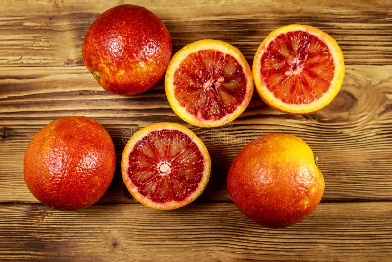 Red Blood Oranges on Wooden Table. Top View Stock Image - Image of food ...