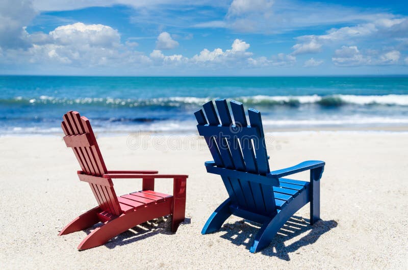 Red and Blue Beach Chairs Near Ocean Stock Photo - Image of vacation ...