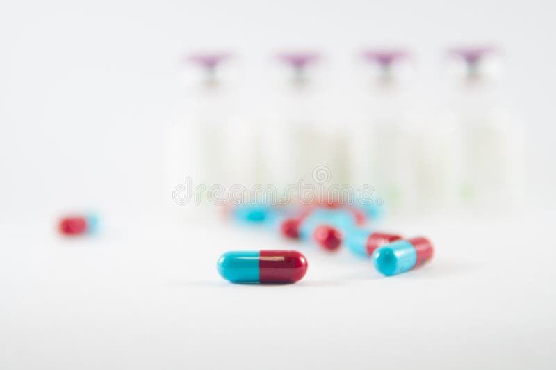 Red And Blue Capsule And Syringe Show Medicine Concept Stock Photo ...