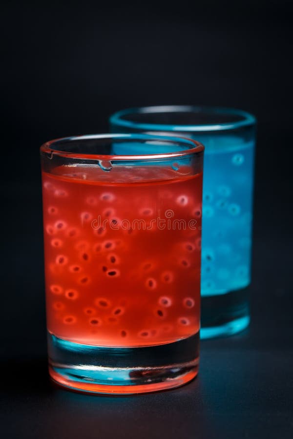 Red and Blue Cocktail on a Black Background Stock Photo - Image of ...