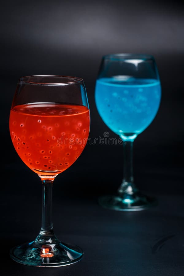Red and Blue Cocktail on a Black Background Stock Image - Image of ...