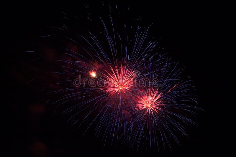 A Red and Blue Fireworks Display Stock Photo - Image of pyrotechnics ...