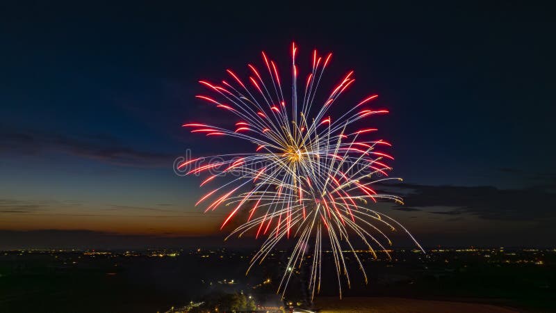 Red and Blue Fireworks Exploding in the Night Sky, Forming Brilliant ...