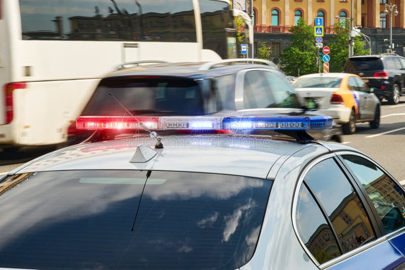 Red and Blue Flashing Lights on Police Car Stock Image - Image of blur ...