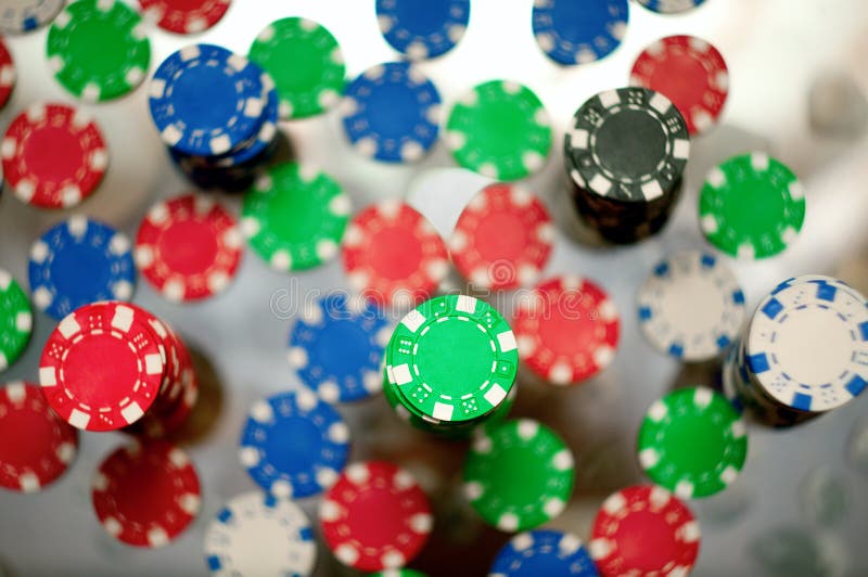 Red, Blue, Green and Black Casino Tokens Stock Photo - Image of dibs ...