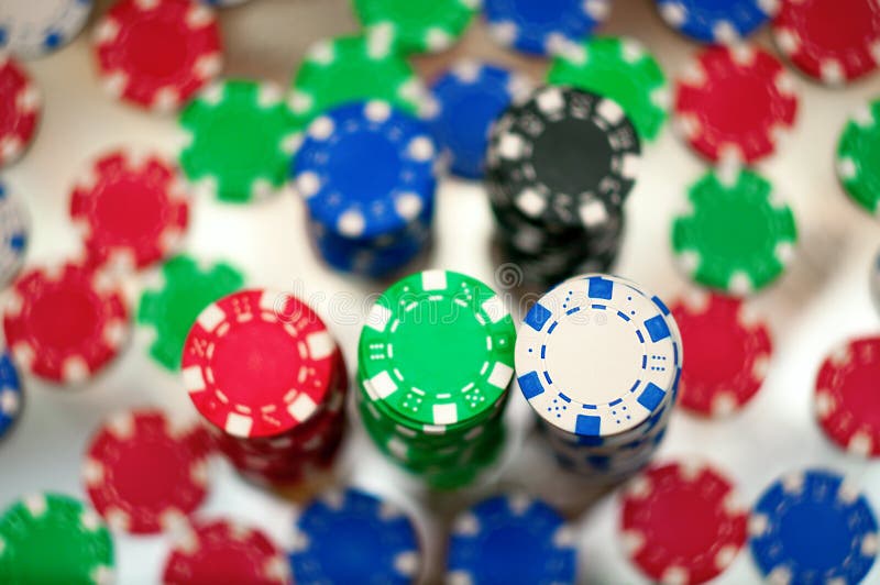 Red, Blue, Green and Black Casino Tokens Stock Image - Image of betting ...