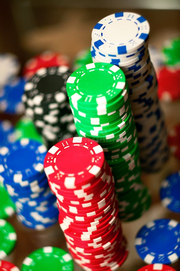 Red, Blue, Green and Black Casino Tokens Stock Photo - Image of gamble ...