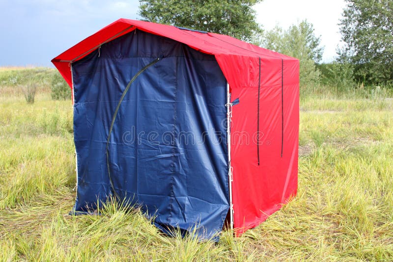 A Red-blue Homemade Tent on a Picnic in a Forest on Grass Stock Image ...