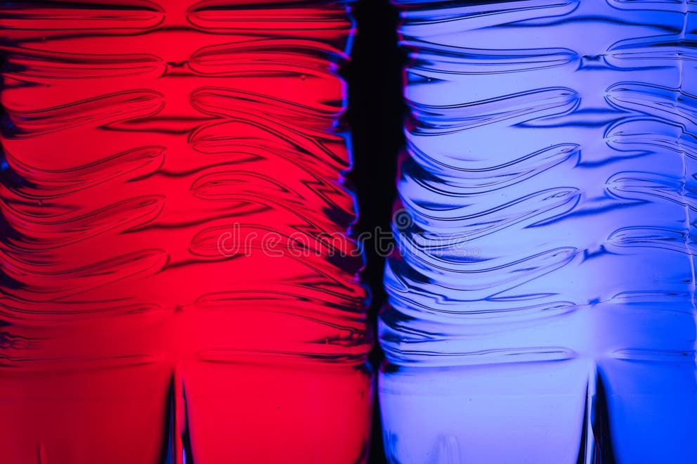 Red and Blue Light Refraction through Clear Plastic Bottle Stock Image ...