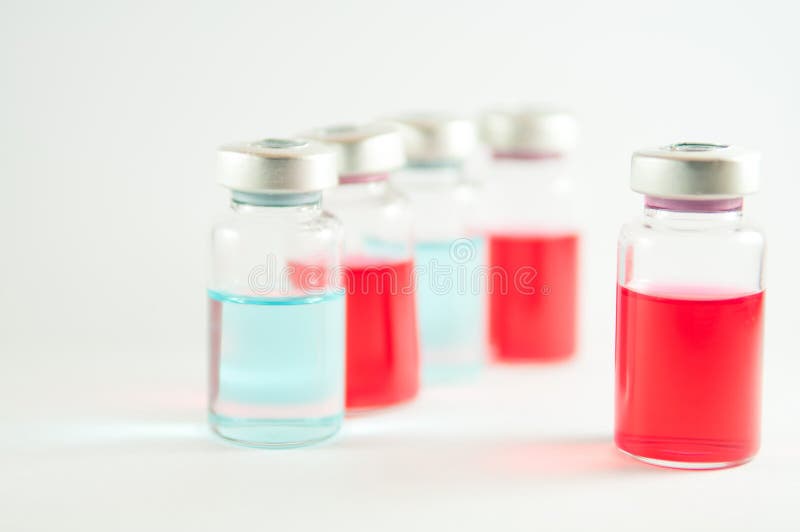 Red and Blue Liquid in Injection Vials Stock Image - Image of ...