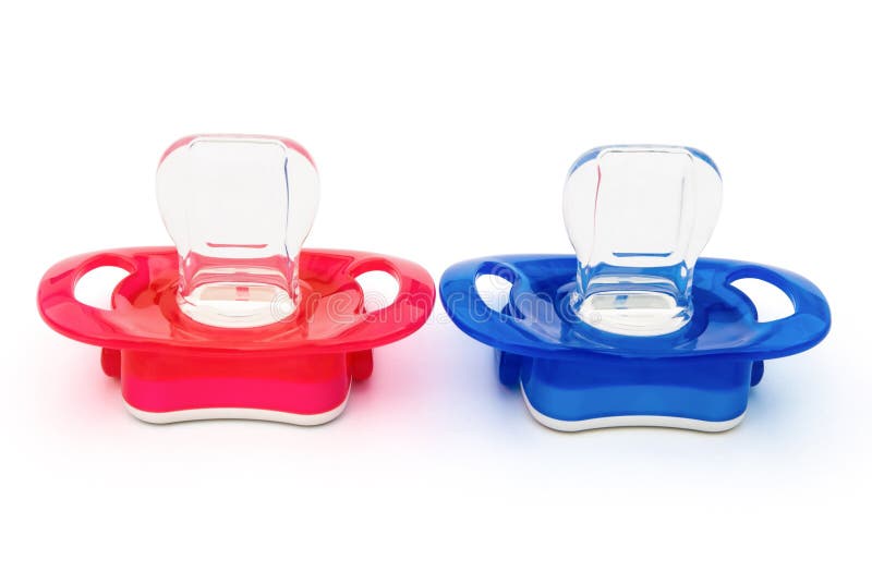 Red and blue pacifiers stock photo. Image of infant, reassure - 29888114