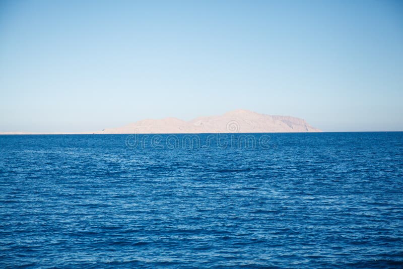 Red Blue Sea and Light Blue Sky Stock Photo - Image of horizon, nature ...