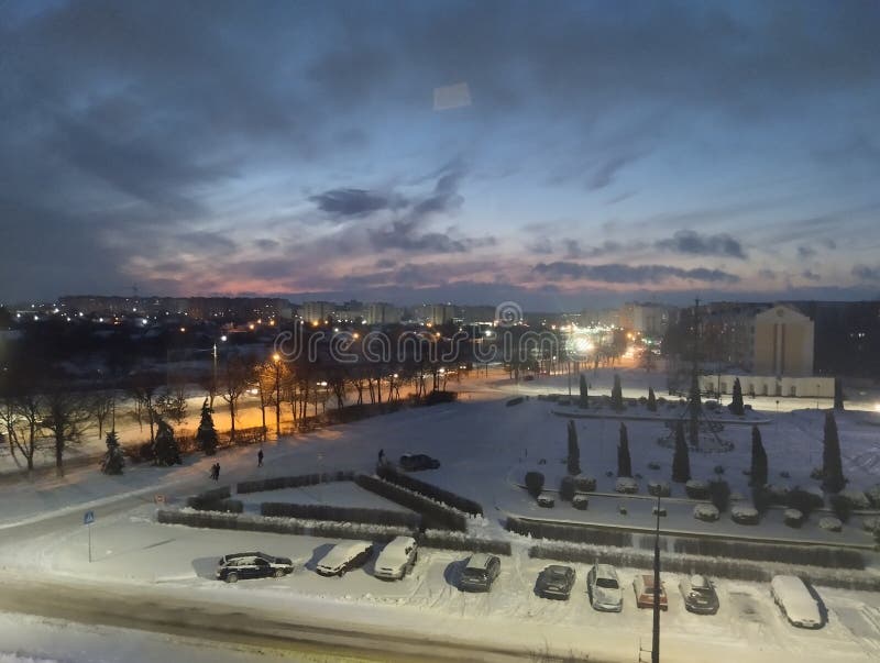 The Red and Blue Sky Over the City. Beautiful Cityscapes with Snow ...