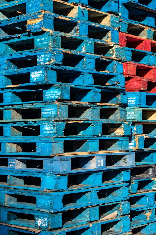 Red and Blue Stacked Pallets Stock Photo - Image of optical, balance ...