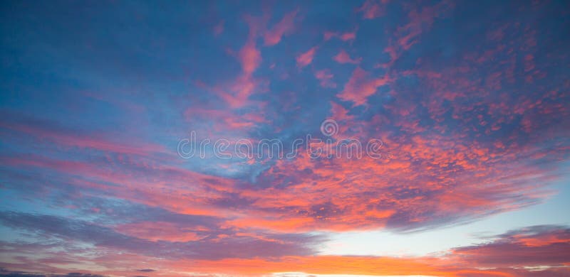 Red and Blue Sunset Sky with Clouds and Sun Stock Image - Image of ...
