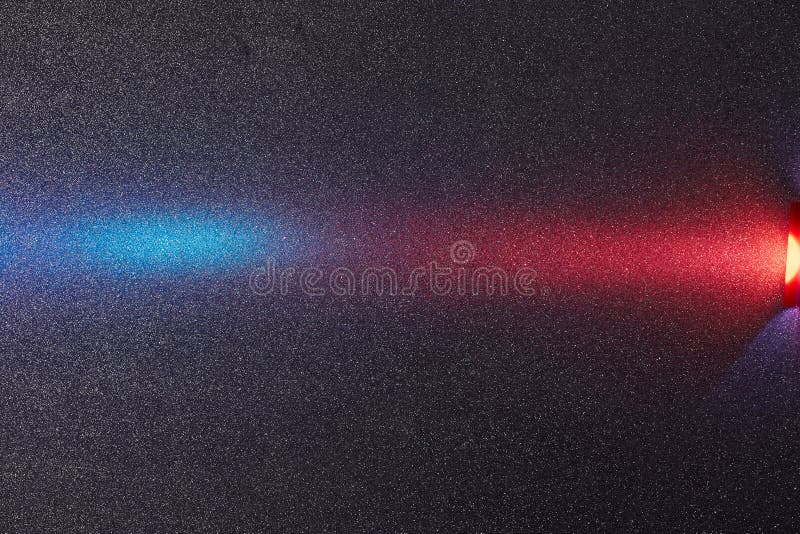 Red and Blue Transient Bright Gradient Beam of Light on Dark Purple ...
