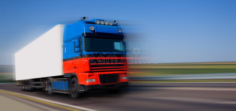 Red lorry on wet road stock photo. Image of motor, interstate - 11036328