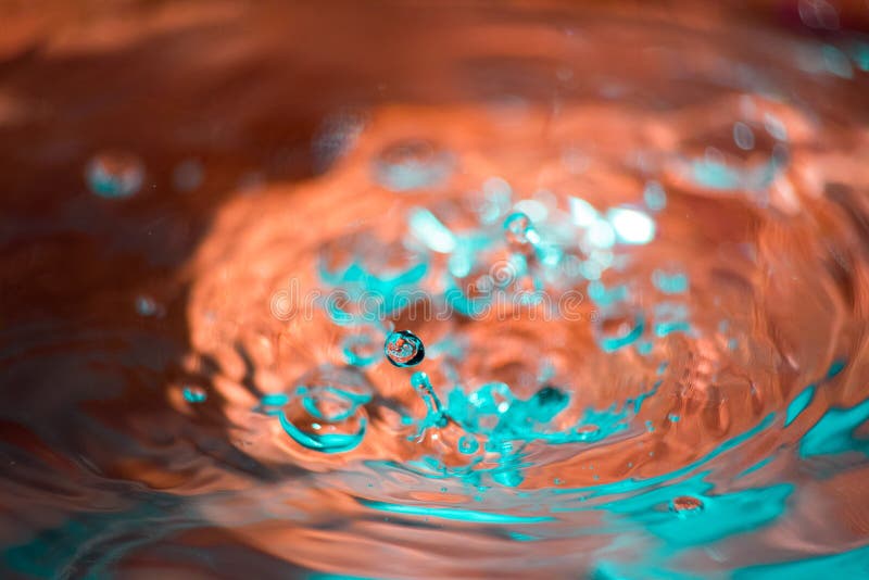 Red with Blue Water Background with Falling Drop Stock Image - Image of ...