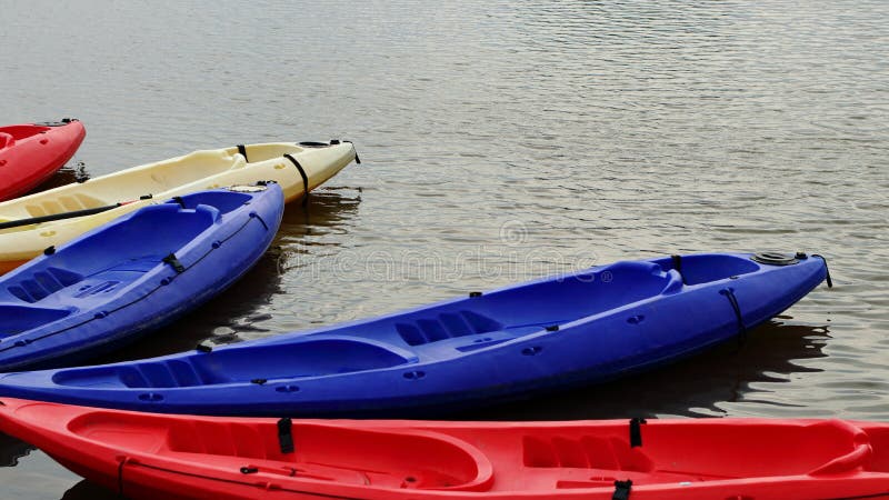 A Red, Blue and White Boat on the Water Surface Background Stock Image ...