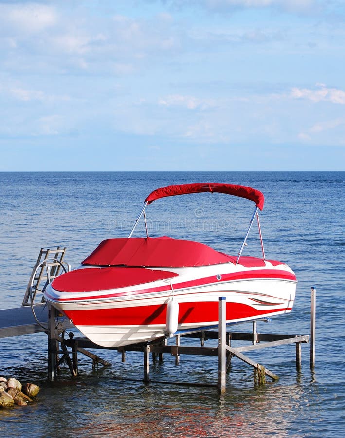 Red Boat on a Dock stock photo. Image of dock, white - 10921784