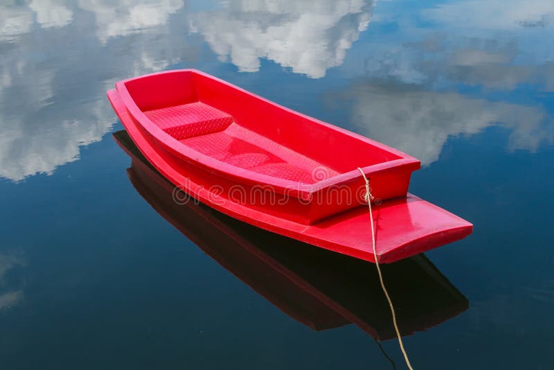 Red boat stock image. Image of water, tied, float, lake - 102083897