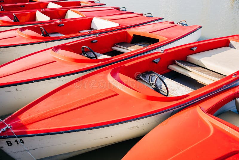 Red Boat with Steering Wheel for Hire Stock Photo - Image of holiday ...