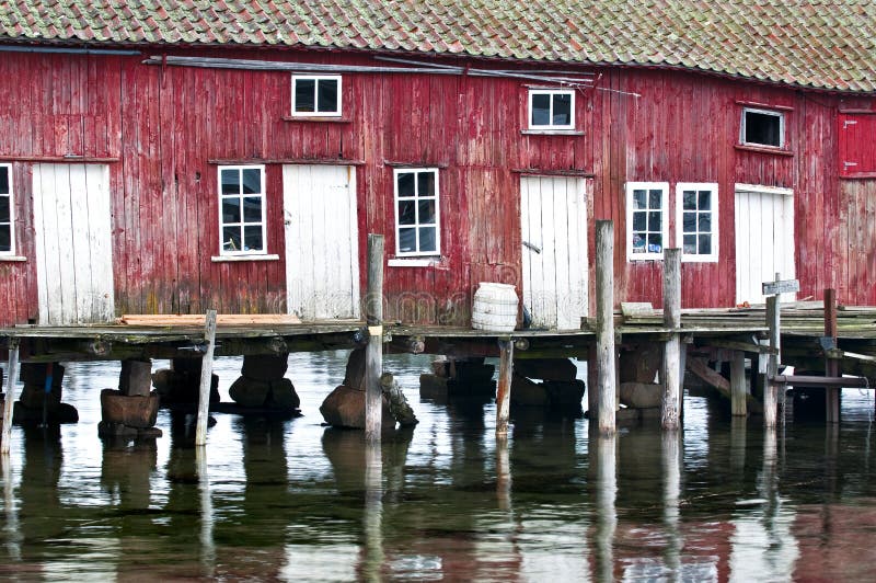 Red_Boathouse stock photo. Image of hill, house, flag - 10751292