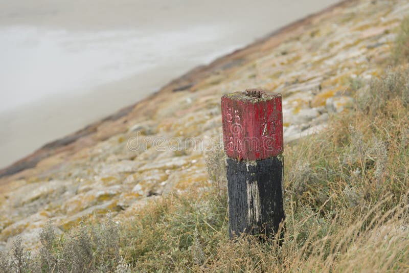 Red bollard on a stock image. Image of angle, bollard - 80886745
