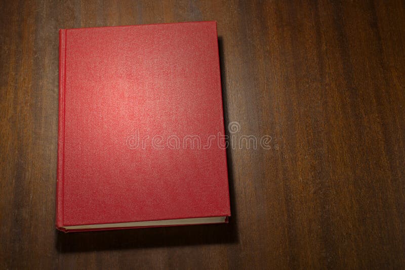 Red book on the table stock image. Image of literary - 92300435