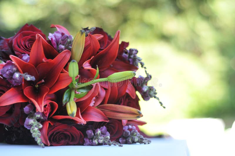Red Bouquet of Flowers on Table Stock Image - Image of closeup, flowers ...