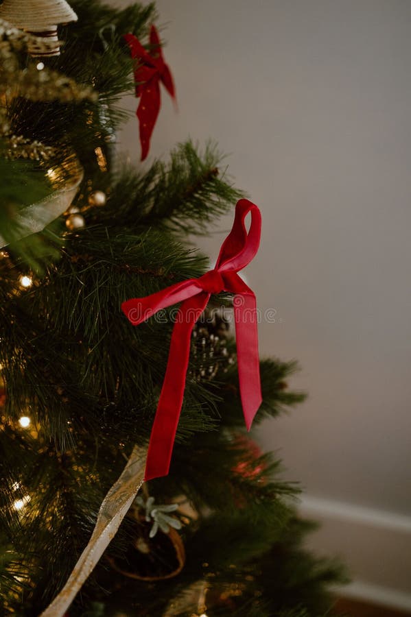 Red Bow on a Christmas Tree Stock Image - Image of decor, traditional ...