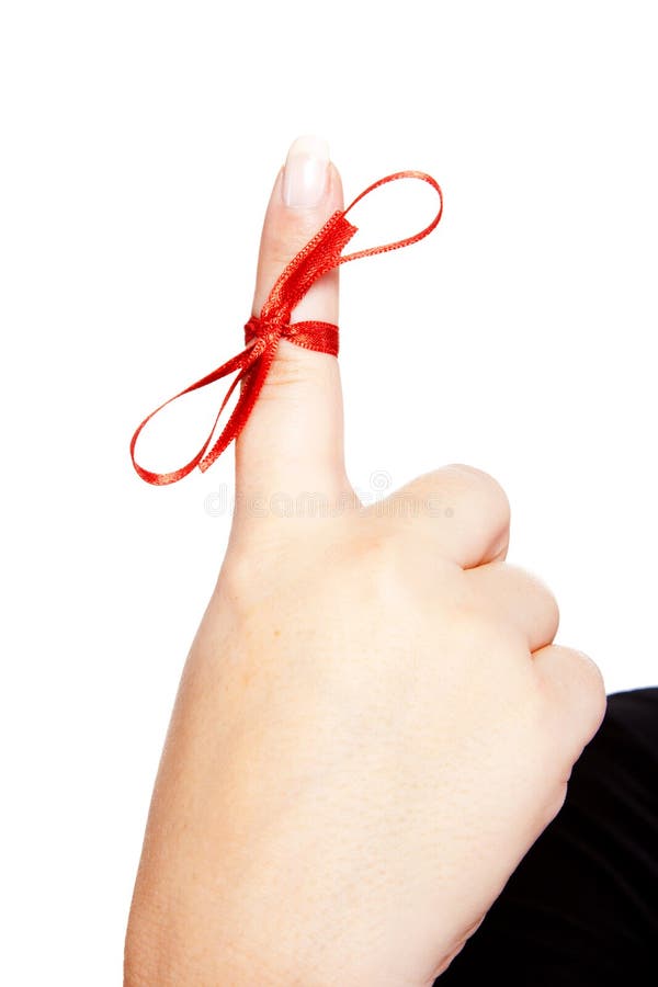 Red bow on finger stock photo. Image of decisions, careless - 10063490