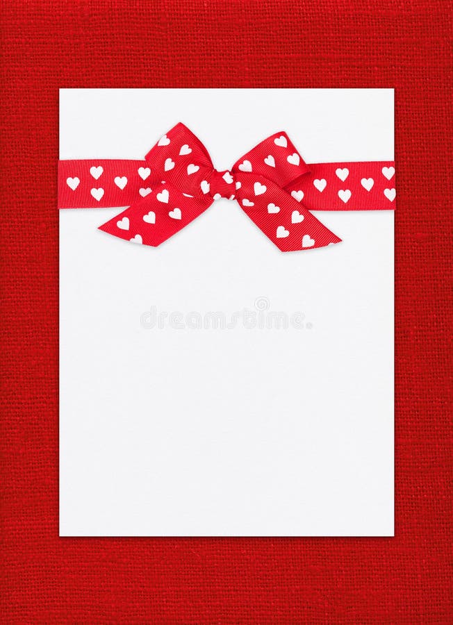 Red bow on paper sheet stock photo. Image of ornate, paper - 28354340