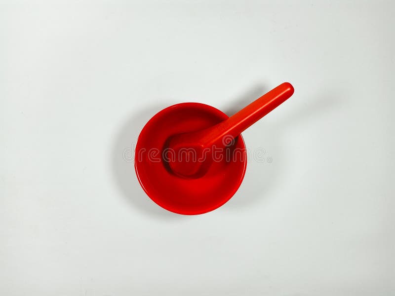 A Red Bowl and a Red Spoon on a White Background Stock Photo - Image of ...
