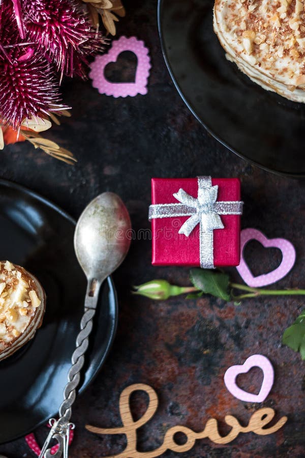 Red Box Gift Over Black Table with Sweet Desert. Stock Image - Image of ...