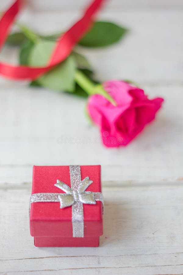 Red Box with Gift on White Wooden Surface Stock Photo - Image of ...