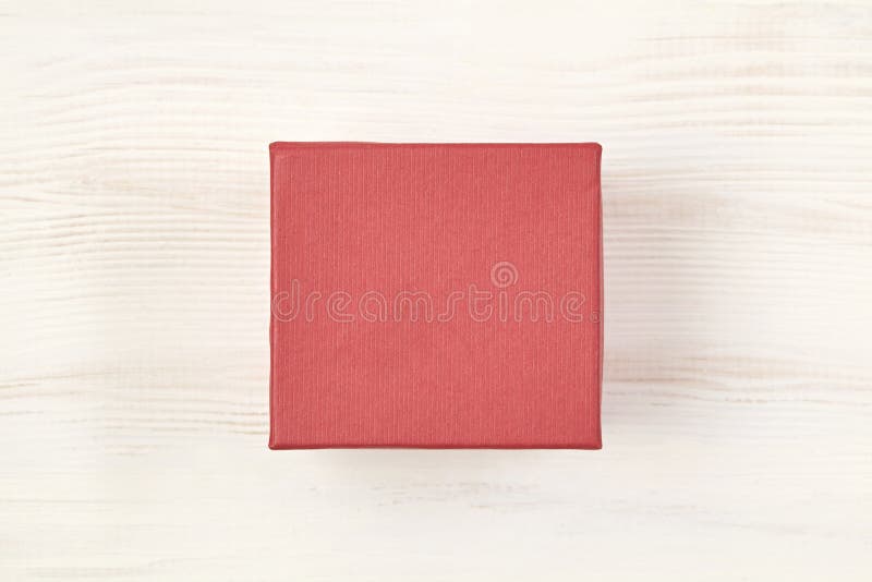 Red Box on White Wooden Background. Top View with Copy Space Stock ...