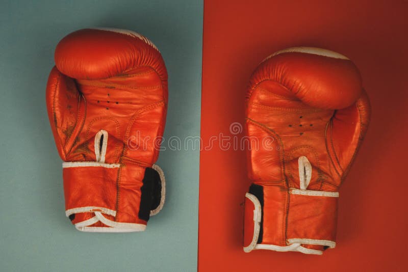 Red Boxing Gloves on Blue Wooden Background Stock Image - Image of ...