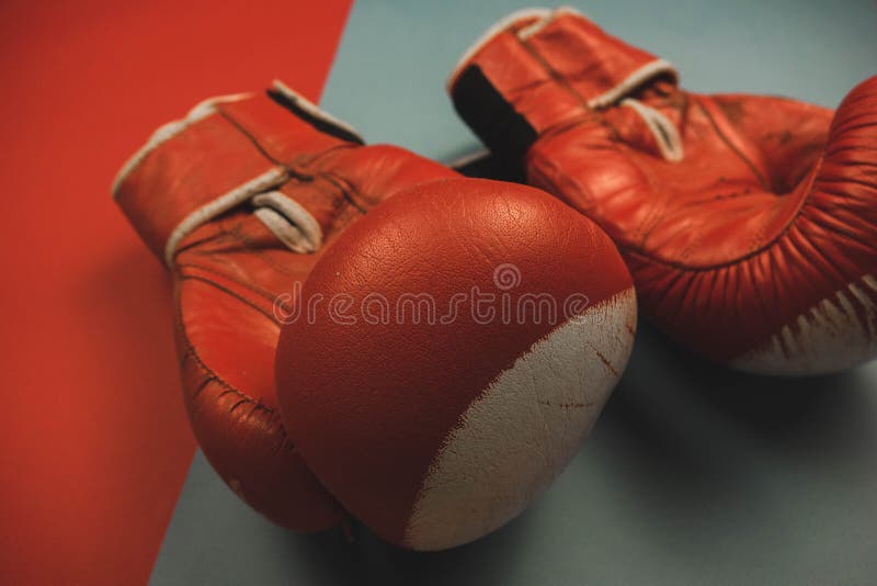 Red Boxing Gloves On A Red And Blue Background Stock Photo - Image of ...