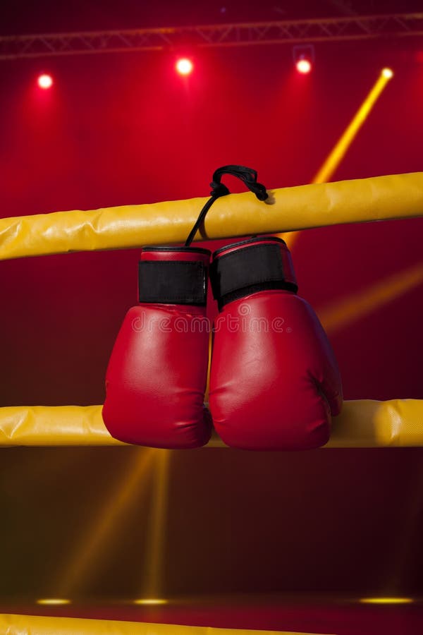 Red Boxing Gloves Hangs Off the Boxing Ring Stock Image - Image of fist ...