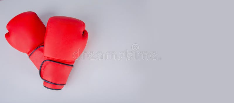 Red Boxing Gloves Over Grey Background. Overcoming Challenges ...