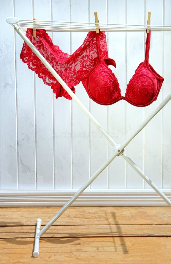 Red Bra and Panties Drying on Clothes Rack Stock Image - Image of silk ...