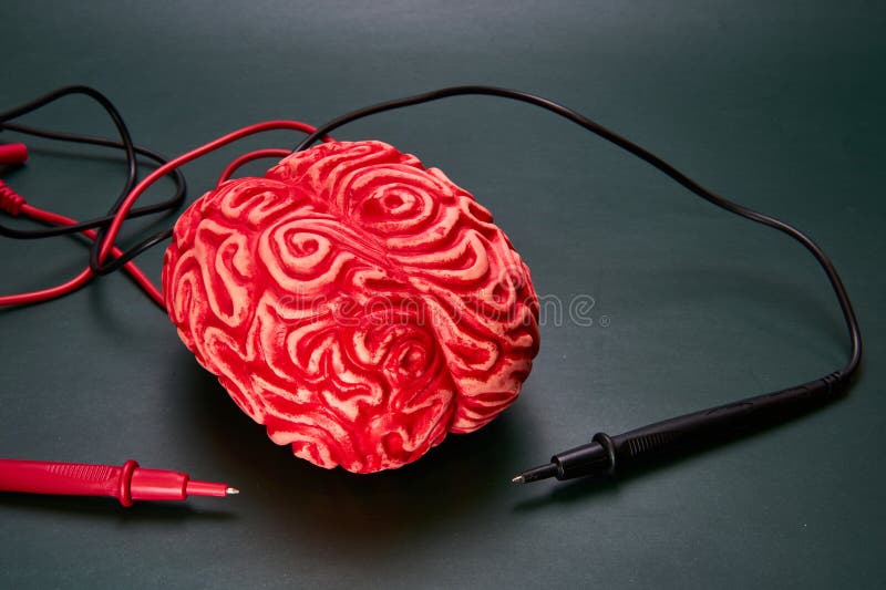 Red Brain with Red and Black Electrodes . Stock Photo - Image of ...