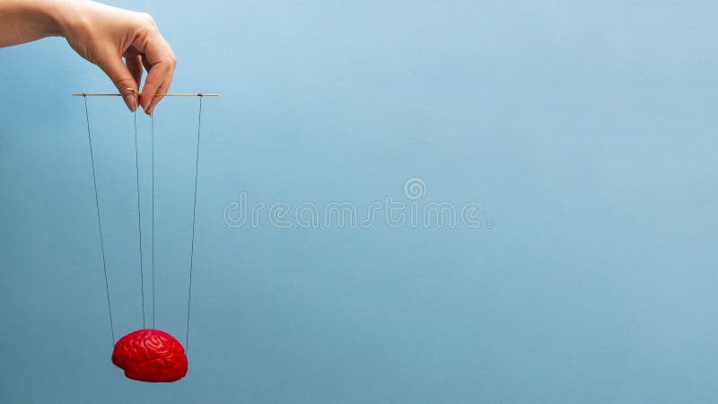 A Red Brain on a Blue Background, a Hand that Manipulates the Mind Like ...