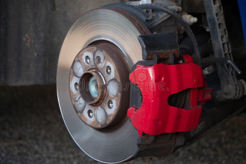 Red Brake Caliper and the Disc is Shiny Stock Photo - Image of ...