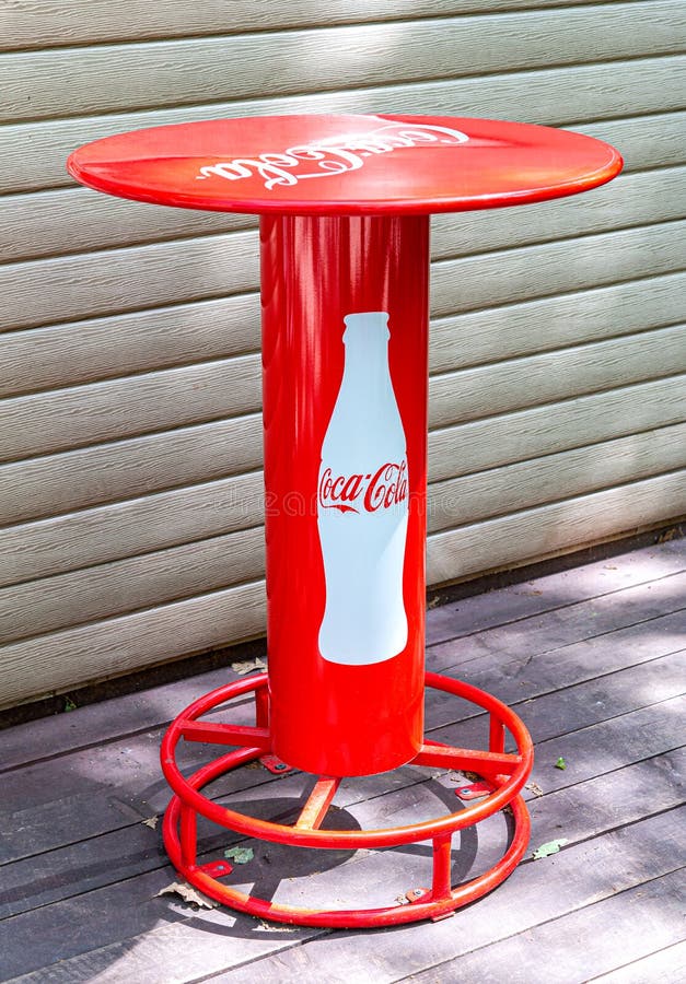 Red Branded Table of the Coca-Cola Company with Logo Editorial Photo ...