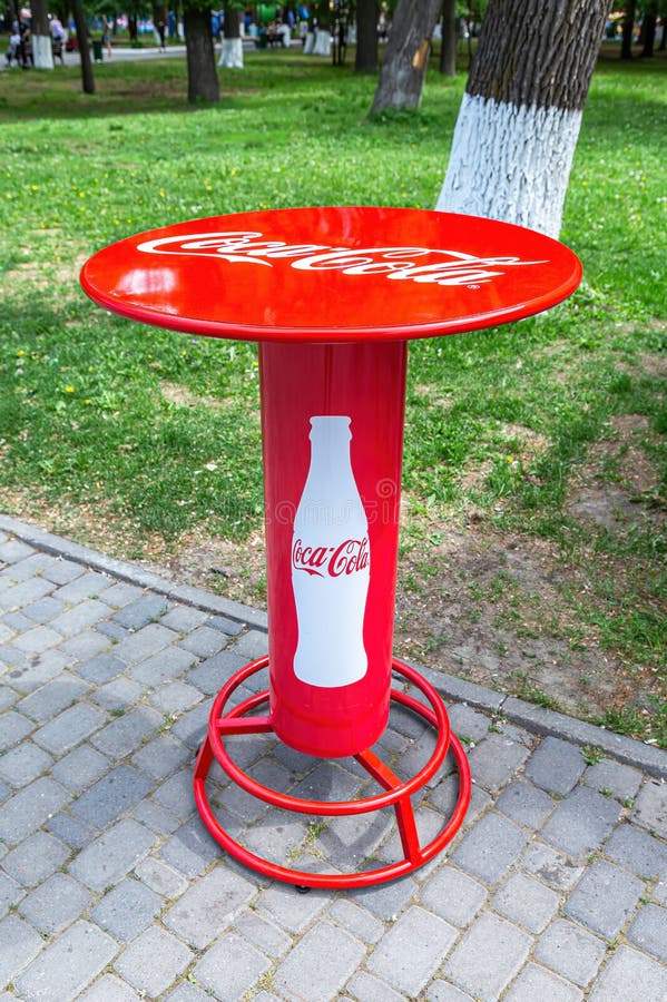 Red Branded Table of the Coca-Cola Company with Logo Editorial Stock ...