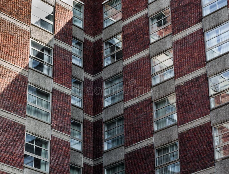 Red-brick Apartment Building with Reflections in Windows Stock Photo ...