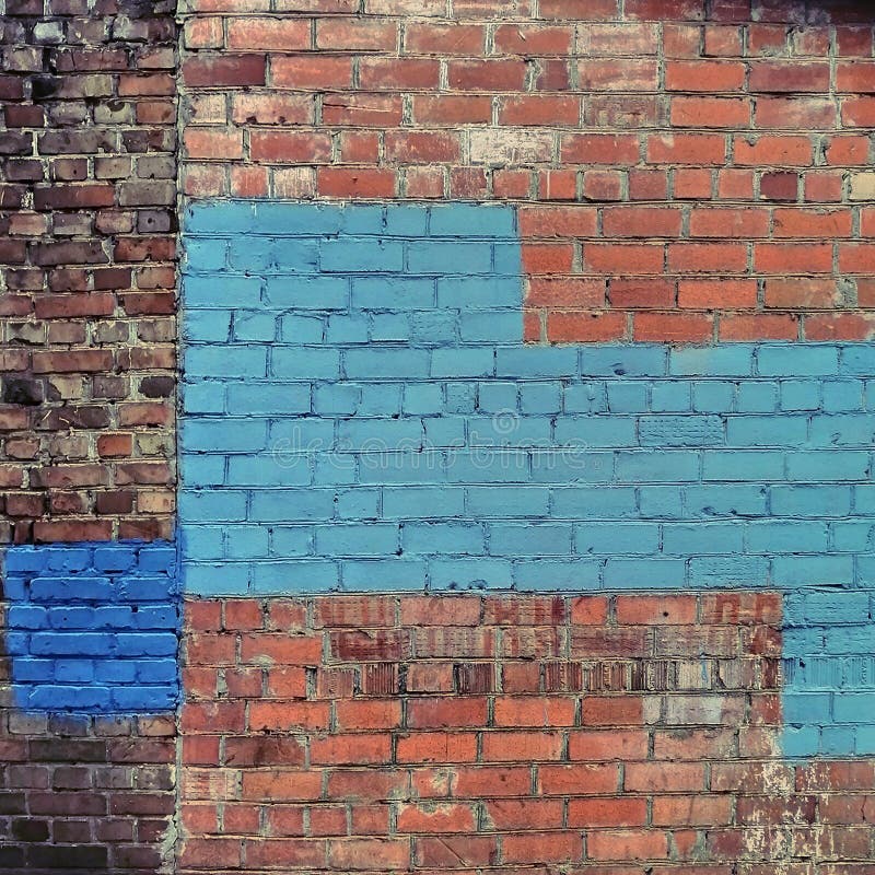 Red Brick Barn Wall with Dark Blue and Blue Paint Stock Image - Image ...